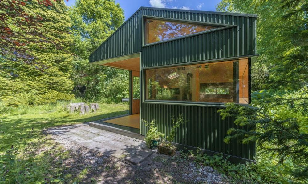 A Tiny Eco-House That Blends In