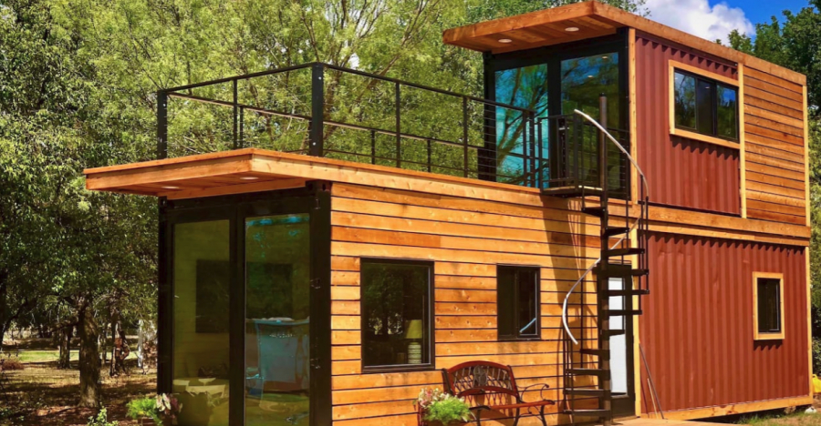 A Stacked Container Home With A Rooftop Patio