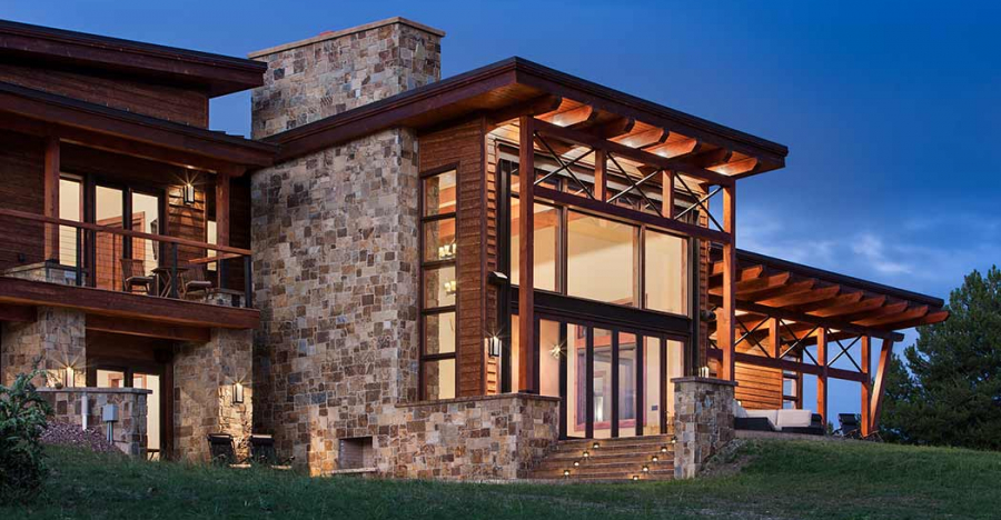 A Stunning Modern Log House with Dark Wood and Stone Accents