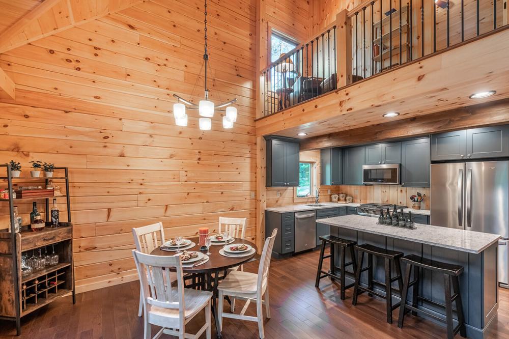 View This Cascade Model Log Home With a Fantastic Porch