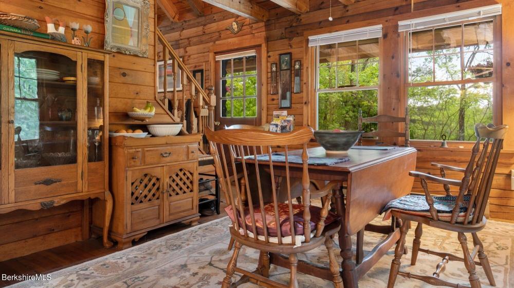 You Should Not Miss This Charming Log Home On 3.77 Wooded Acres