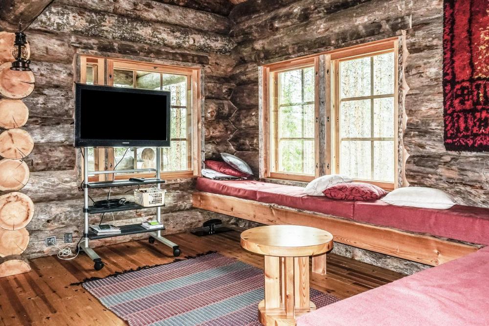Take A Look Inside This Rustic Log Cottage With Sleeping Loft